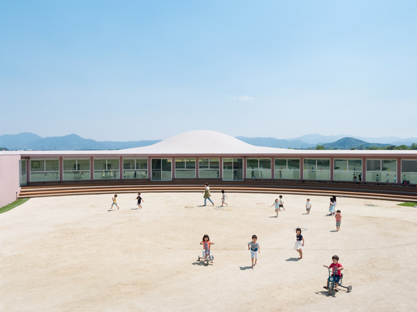 ryuji fujimura tops subaru nursery school in japan with curved concrete ...
