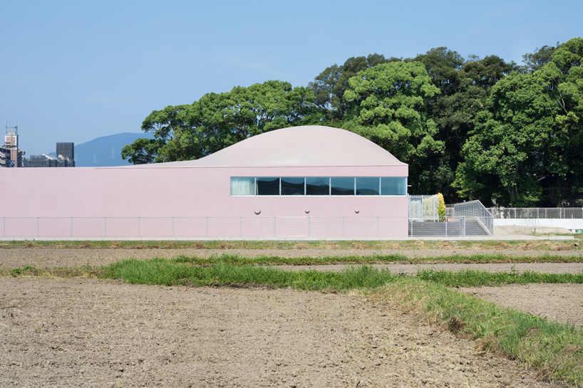 ryuji fujimura tops subaru nursery school in japan with curved concrete ...