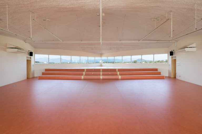 ryuji fujimura tops subaru nursery school in japan with curved concrete ...