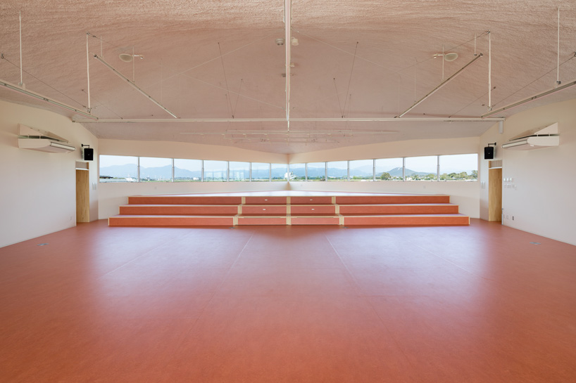 ryuji fujimura tops subaru nursery school in japan with curved concrete ...