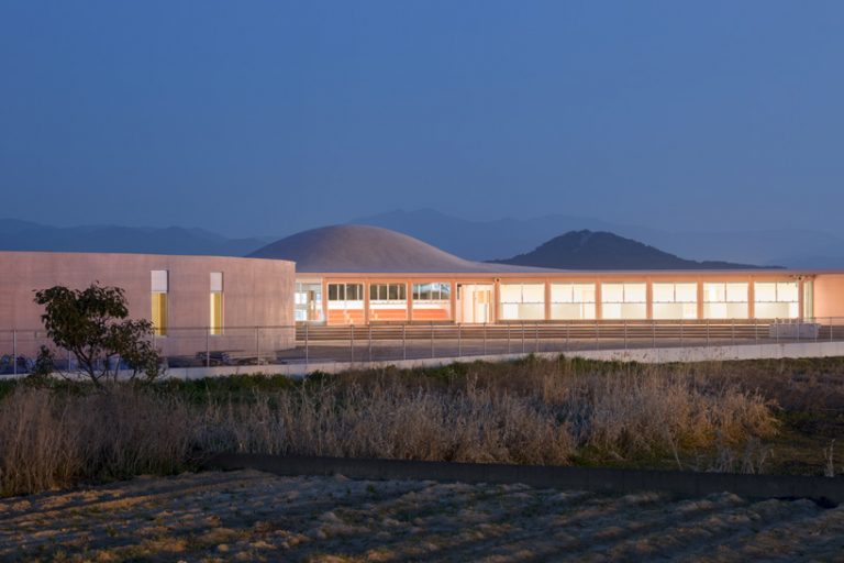 ryuji fujimura tops subaru nursery school in japan with curved concrete ...
