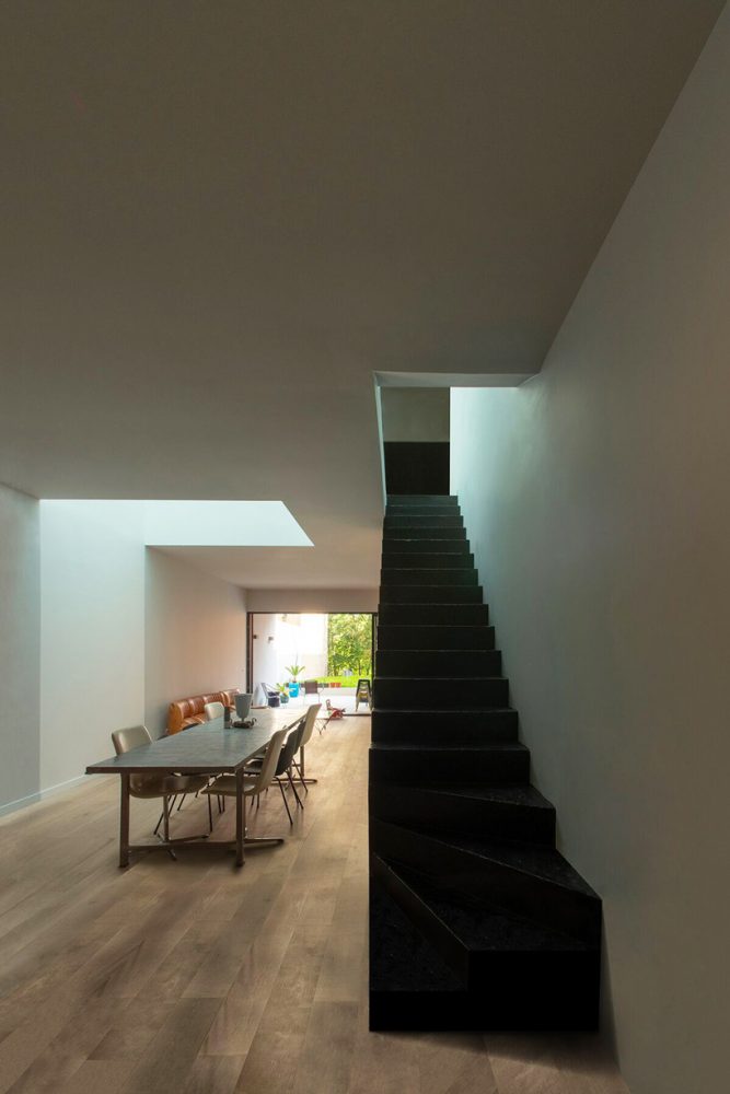 studio malka architecture adds golden block extension to residential ...