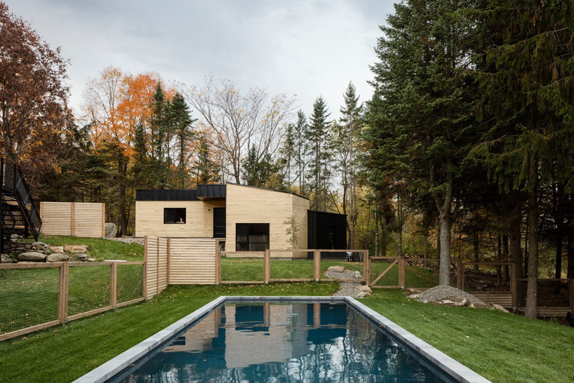 interconnected modules with offset façades form the abercorn chalet in ...