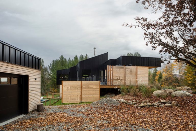 interconnected modules with offset façades form the abercorn chalet in ...