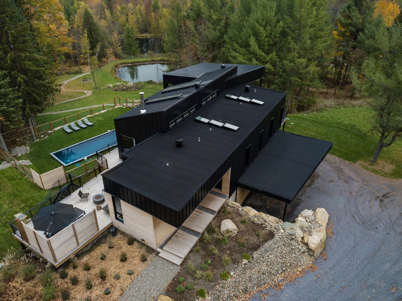 interconnected modules with offset façades form the abercorn chalet in ...