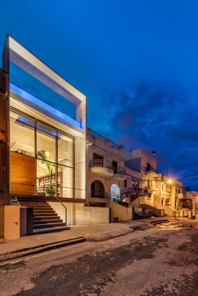 architrend tops house B in malta with see-through swimming pool