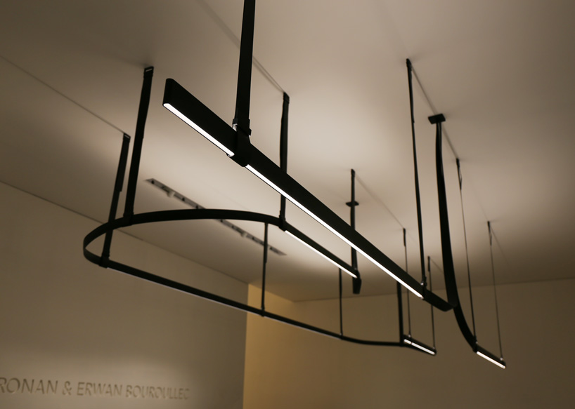 pinball corridor introduces visitors to flos' booth at salone del mobile