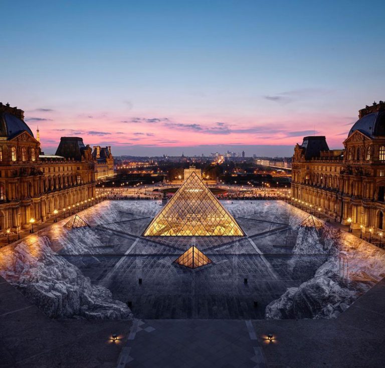 street artist JR transforms musée du louvre with epic optical illusion