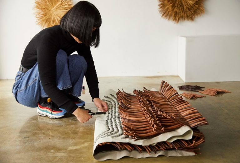 bamboo artists craft LOEWE leather into unique pieces at milan design week