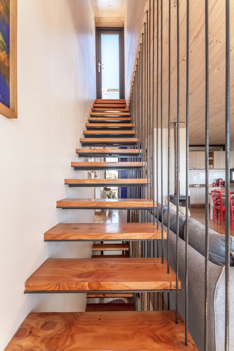 a detached latticed structure wraps around tacna house by par arquitectos