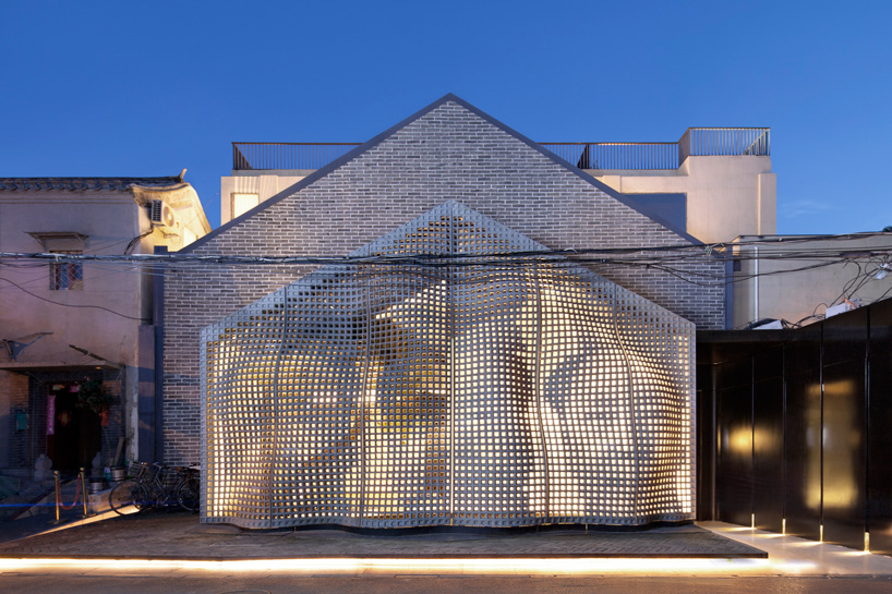 cultural space in beijing complete with digitally fabricated façade of ...