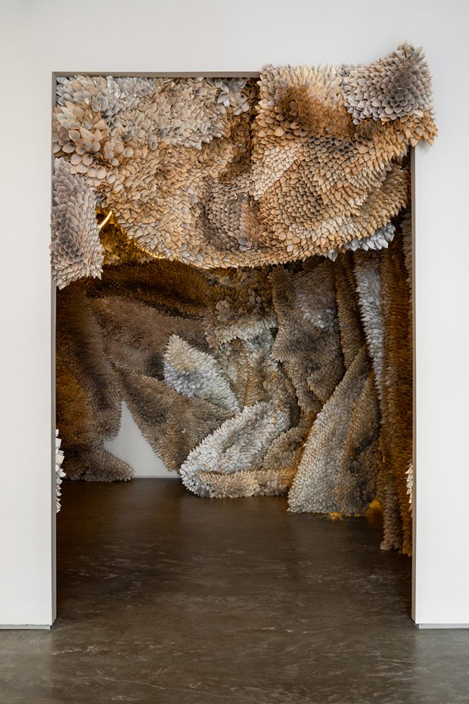 samuelle green uses paper and chicken wire to intricately weave an ...