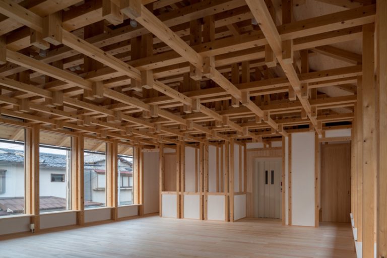 kazuya morita builds wooden lattice frame structure for archive library ...