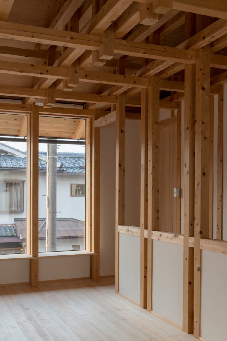 kazuya morita builds wooden lattice frame structure for archive library ...