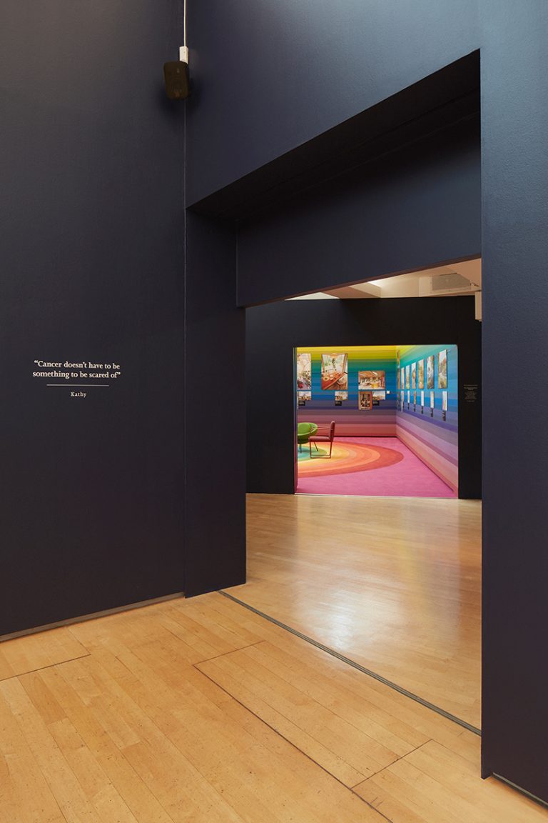 rainbow stripes hug the floor and ascend to exposed windows at this ...