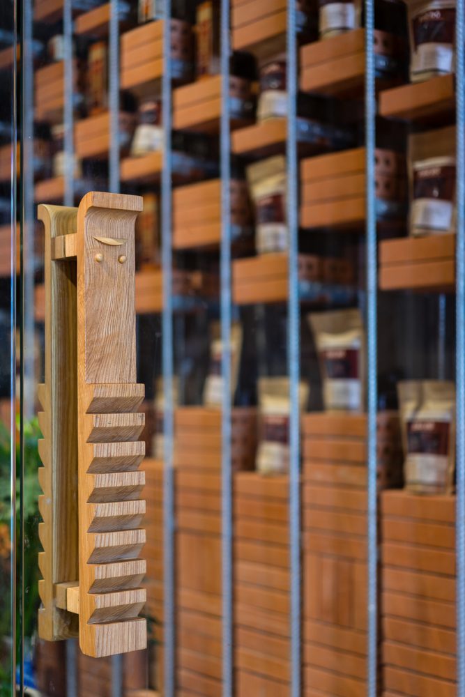 tropical space constructs vietnamese showroom with clay brick + metal ...