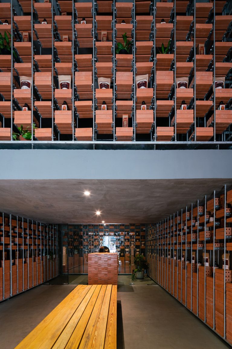 tropical space constructs vietnamese showroom with clay brick + metal ...