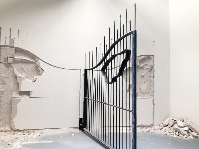 shilpa gupta's metal gate continuously swings back and forth breaking ...