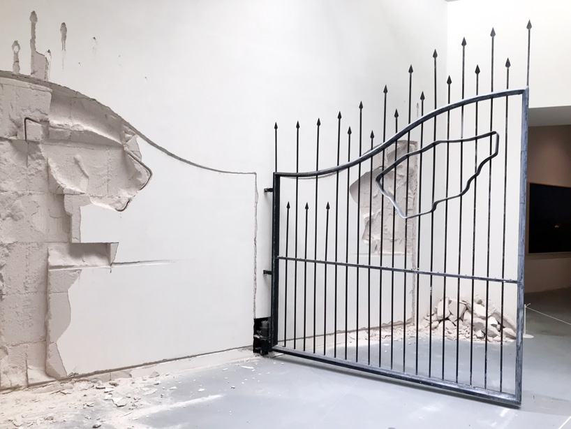shilpa gupta's metal gate continuously swings back and forth breaking ...