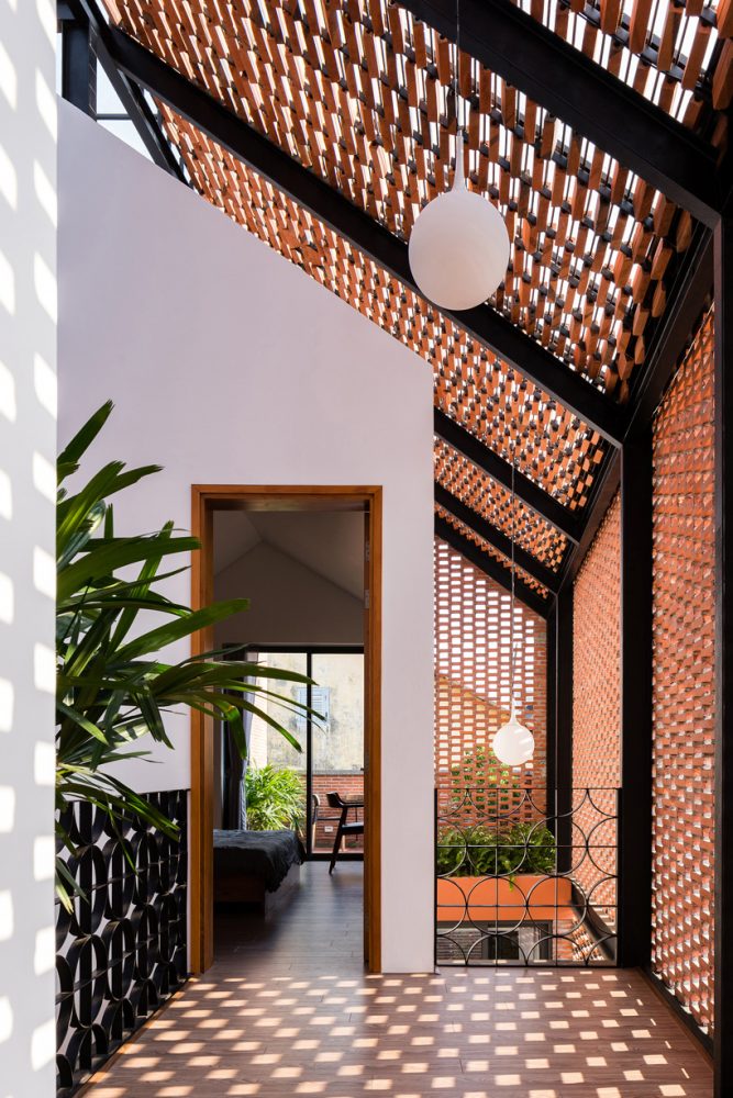 block architects encloses house in vietnam with patterned brick shell