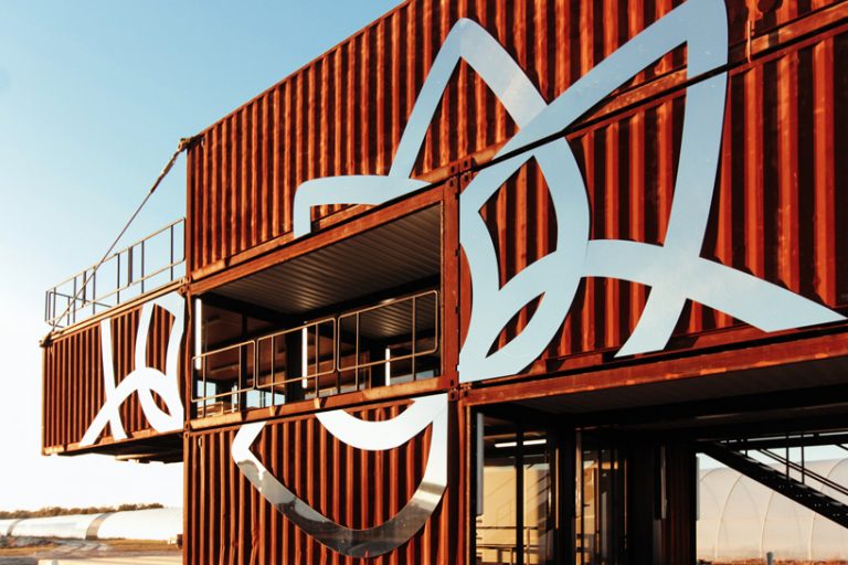 eligostudio stacks shipping containers for agriculture company ...