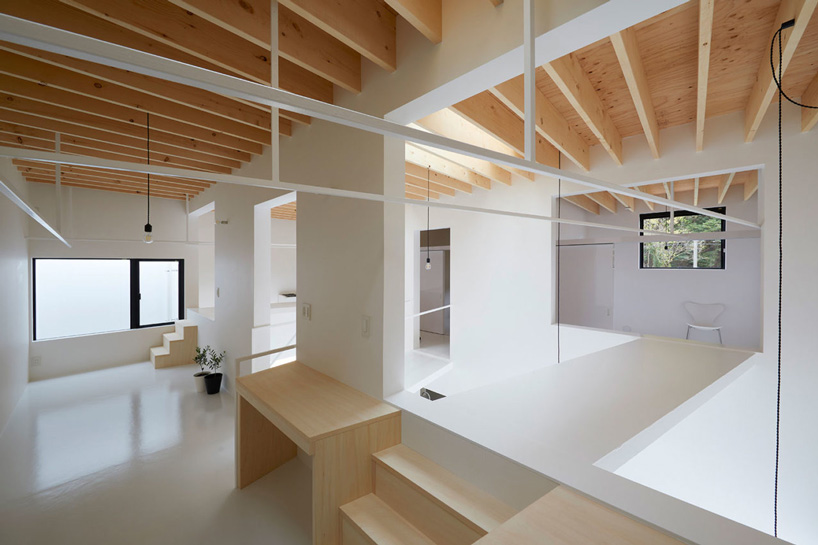 atelier kenta eto wraps cube house in black aluminum in kadokawa, japan