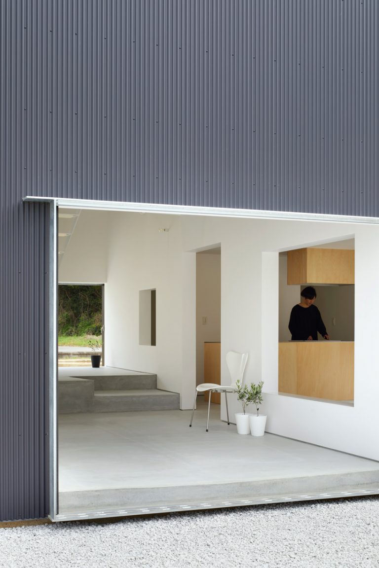 atelier kenta eto wraps cube house in black aluminum in kadokawa, japan