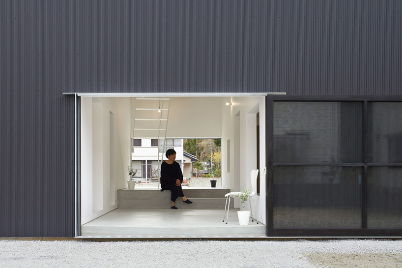 atelier kenta eto wraps cube house in black aluminum in kadokawa, japan