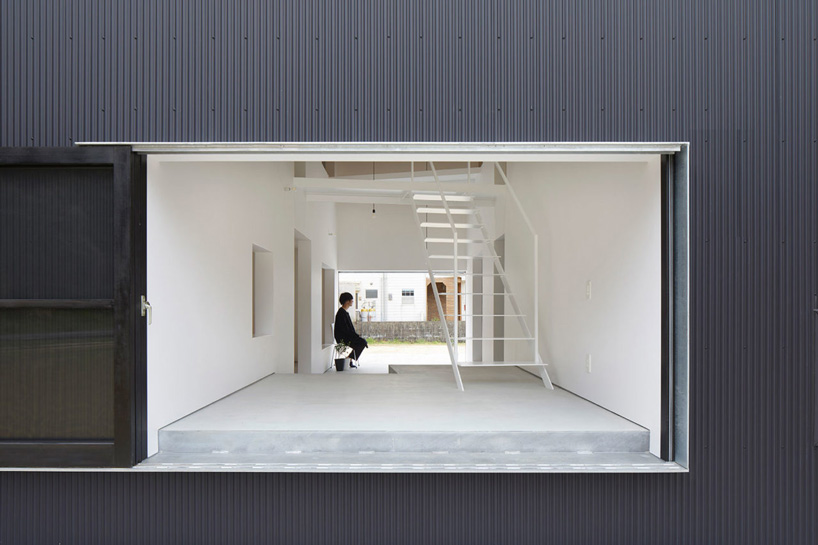 atelier kenta eto wraps cube house in black aluminum in kadokawa, japan