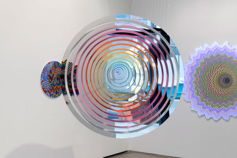 jen stark transforms new york city gallery into kaleidoscope of color