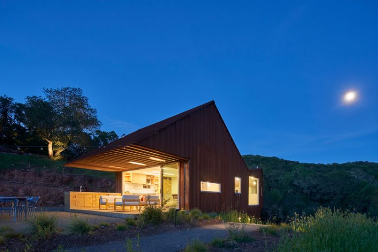 the triple barn house reflects the landscape of california's sonoma valley