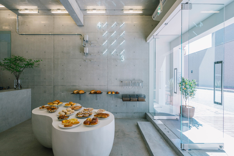 fathom designs japanese bakery ripi as a continuous space of concrete ...