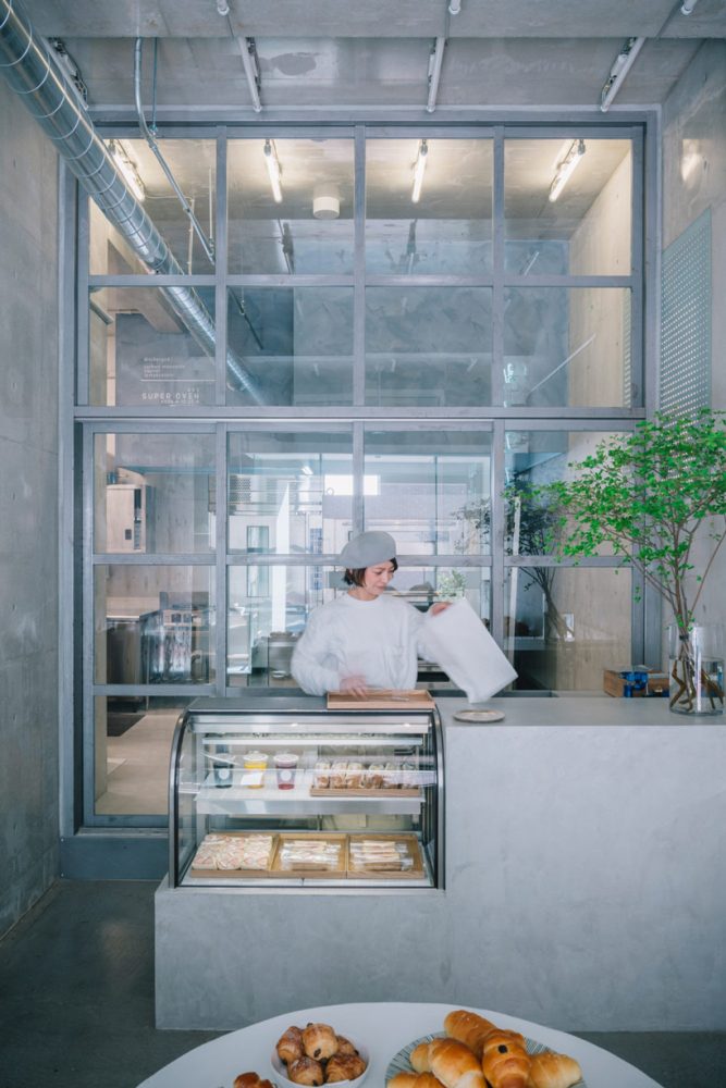 fathom designs japanese bakery ripi as a continuous space of concrete ...