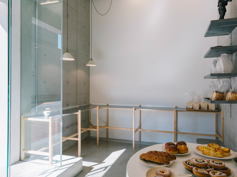 fathom designs japanese bakery ripi as a continuous space of concrete ...