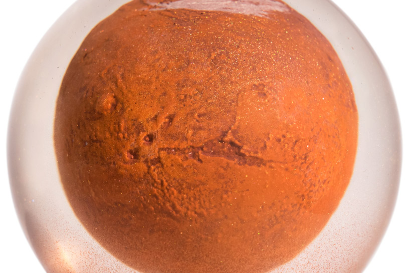 dan abramson's mars dust globe depicts the planet's signature red storms