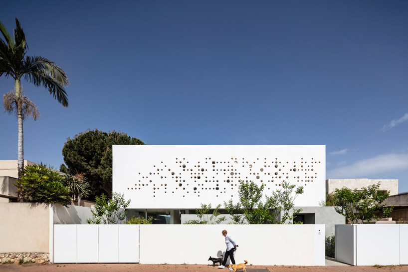 anderman architects completes house in israel with perforated façade