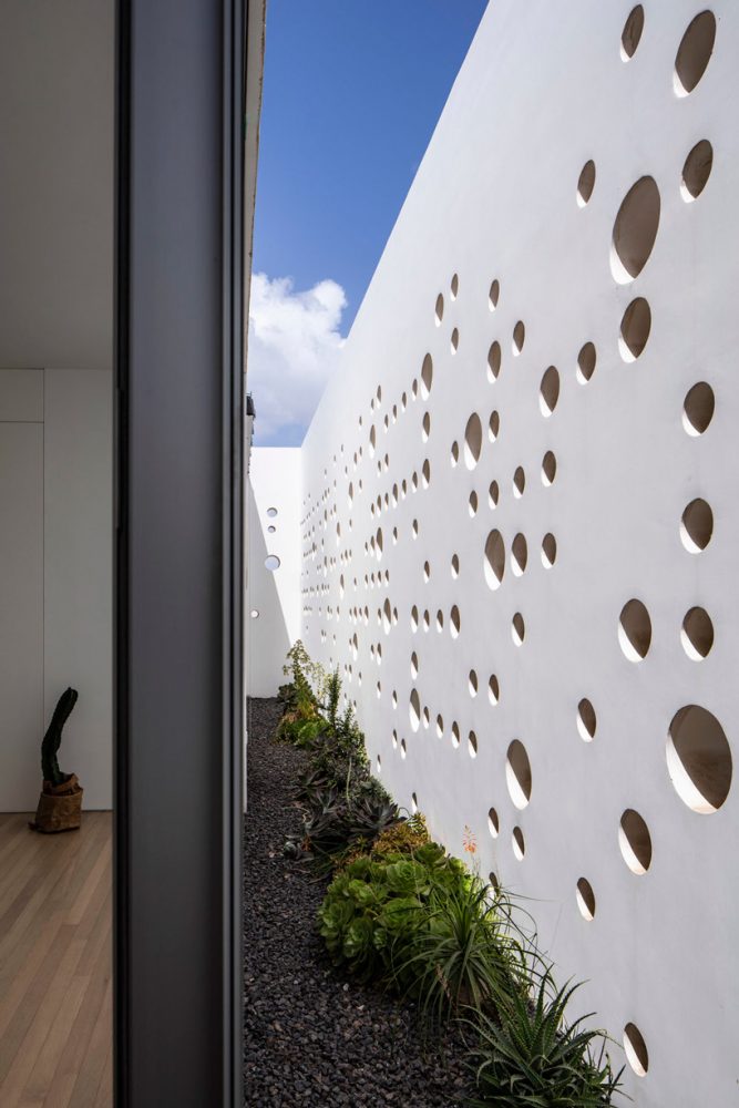 anderman architects completes house in israel with perforated façade
