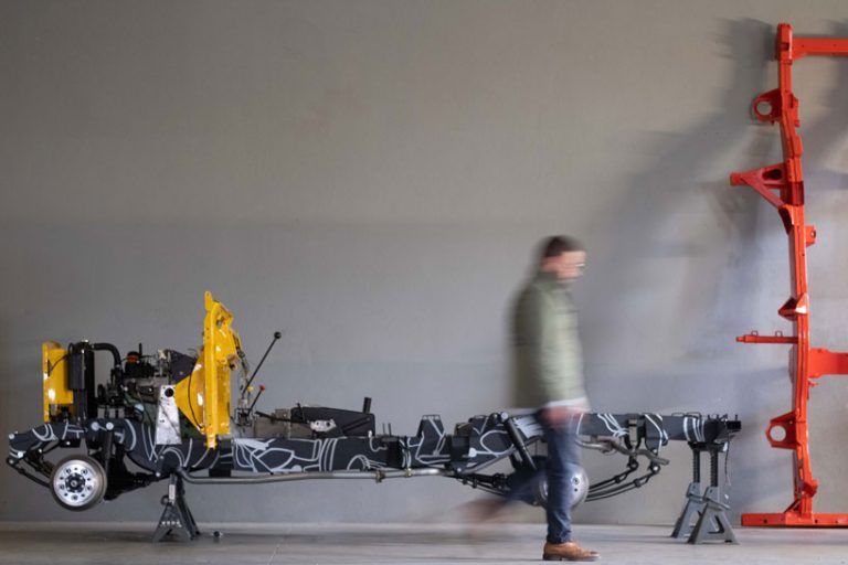 coolnvintage and deus ex-machina present a motorcycle hauling land rover