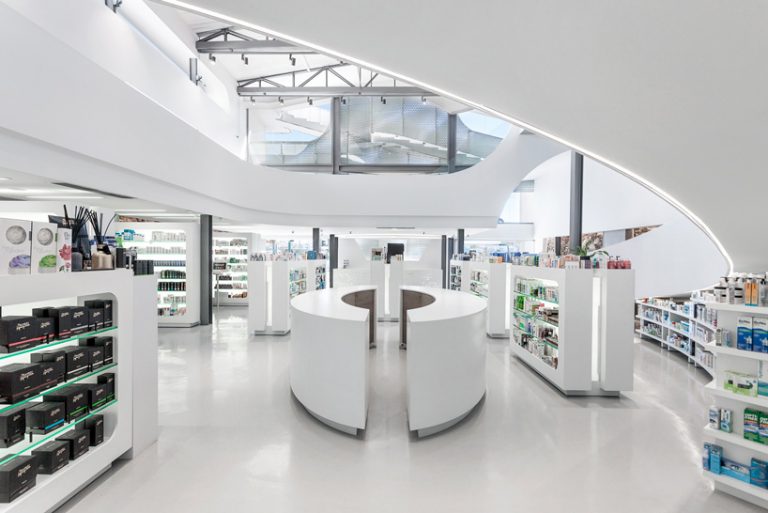 klab architecture completes pharmacy with triangular perforated façade ...