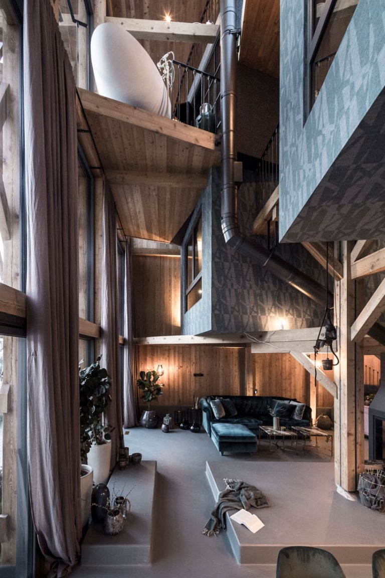 noa* designs traditional alpine mountain home with unexpected interiors