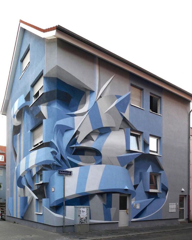 peeta paints large-scale optical illusion murals to transform buildings