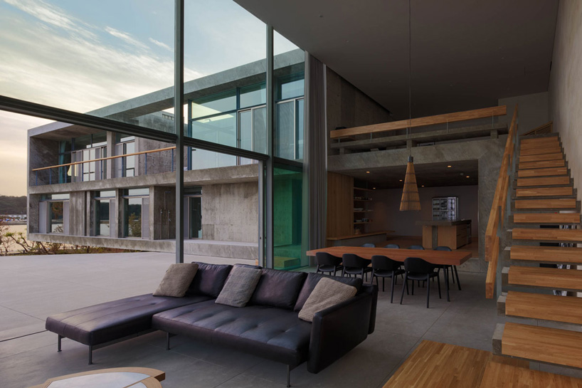 mount fuji architects studio's residence emerges from a peninsula in japan