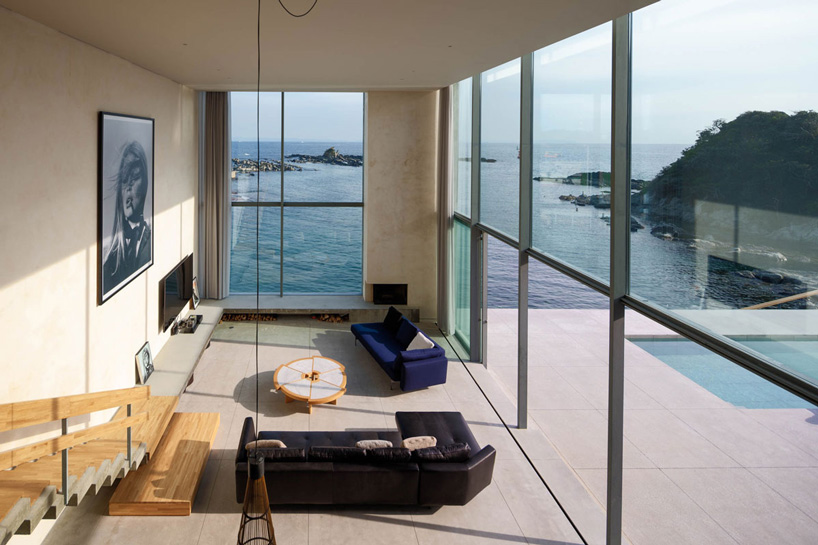 mount fuji architects studio's residence emerges from a peninsula in japan