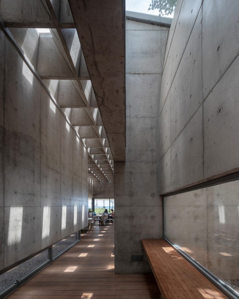 concrete waffle beams bring light into vector architects' restaurant in ...