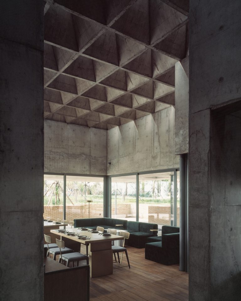 concrete waffle beams bring light into vector architects' restaurant in ...