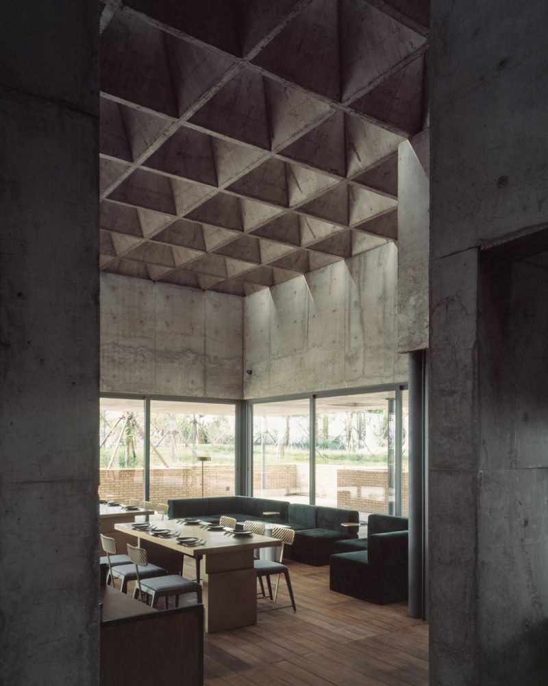 concrete waffle beams bring light into vector architects' restaurant in ...