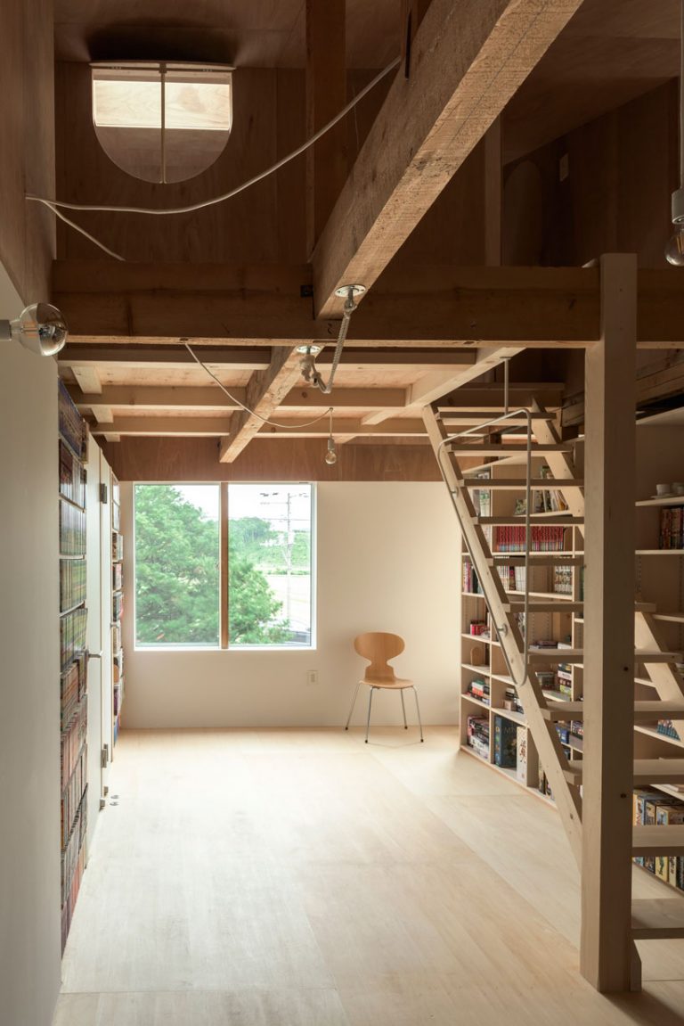 deformed roof house in rural japan receives greenhouse-like extension