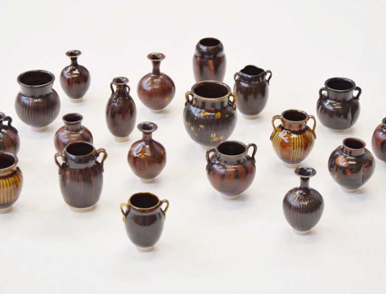 artist yuta segawa hand-throws thousands of tiny ceramic vases