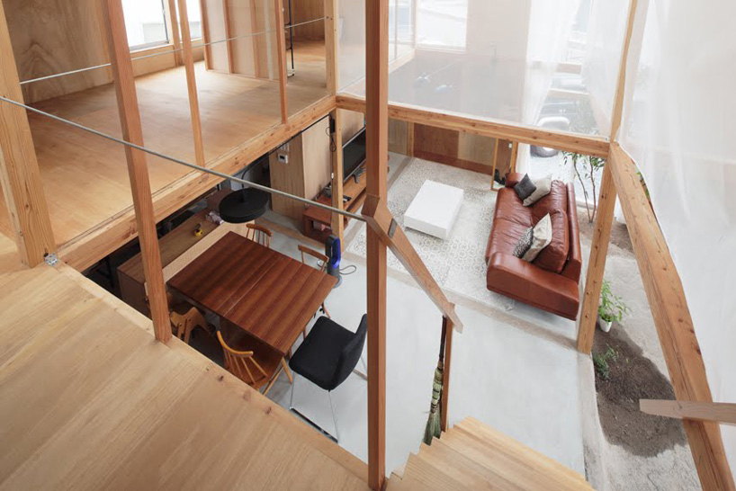 ikimono architects divides areas of this japanese house using a wooden grid