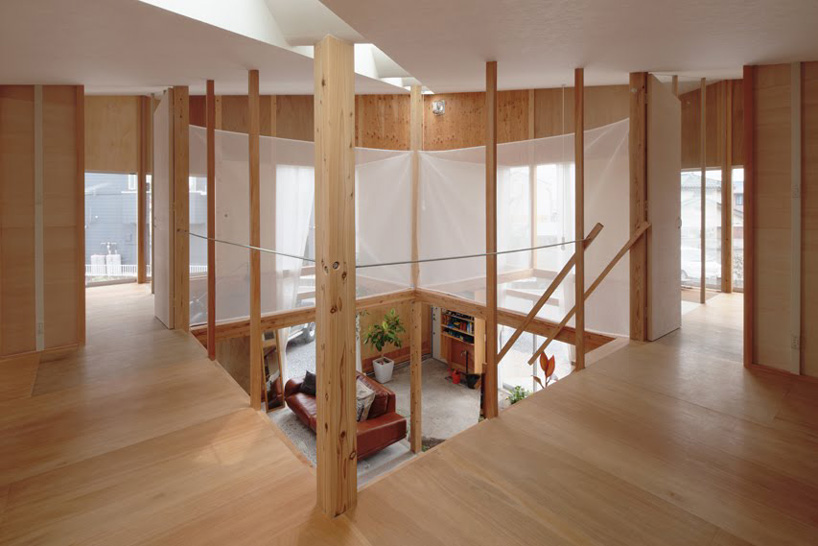 ikimono architects divides areas of this japanese house using a wooden grid